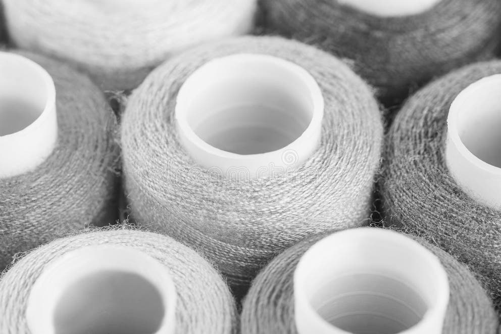 Plastic Spools of Thread for a Sewing Machine, Black and White Stock ...
