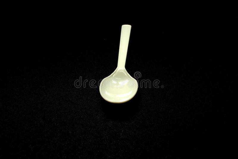 Plastic Spoon on Black Back Stock Photo - Image of equipment, food ...