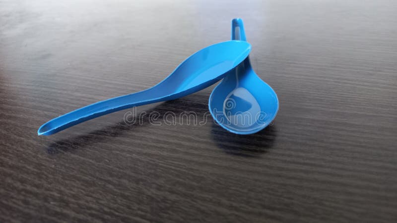 Plastic Spoon or Kitchen Equipment Stock Photo - Image of wing, blue ...