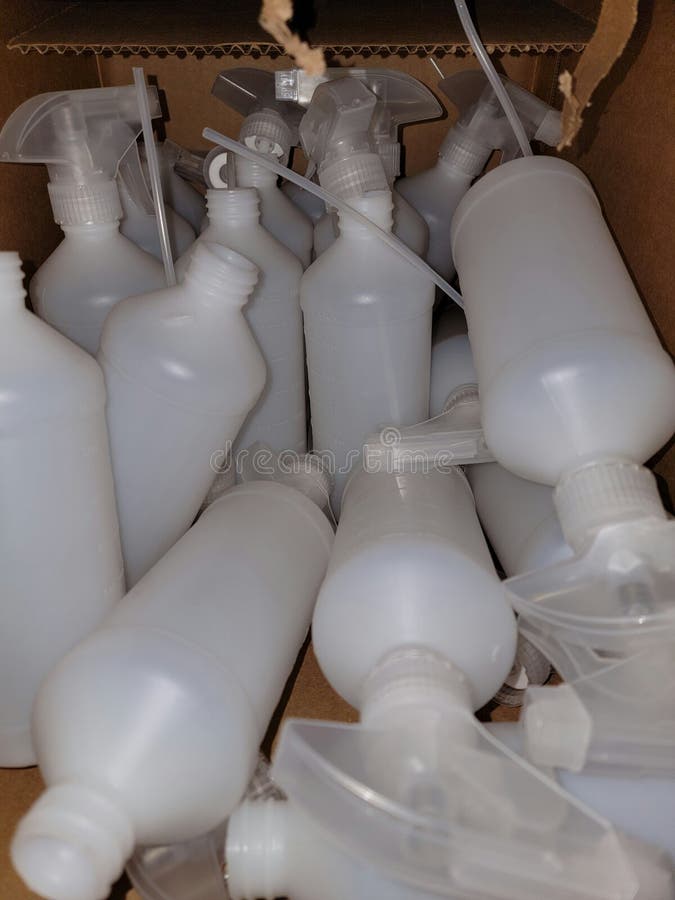 Plastic Spray Bottles in Cardboard Box Stock Photo - Image of cardboard ...