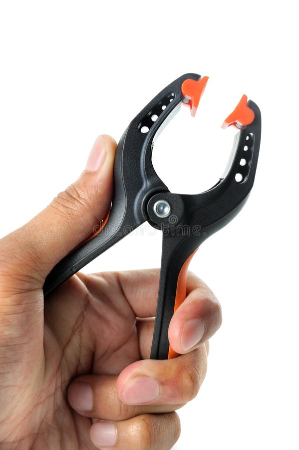 Plastic Spring Clamp in Hand Stock Image - Image of white, equipment ...