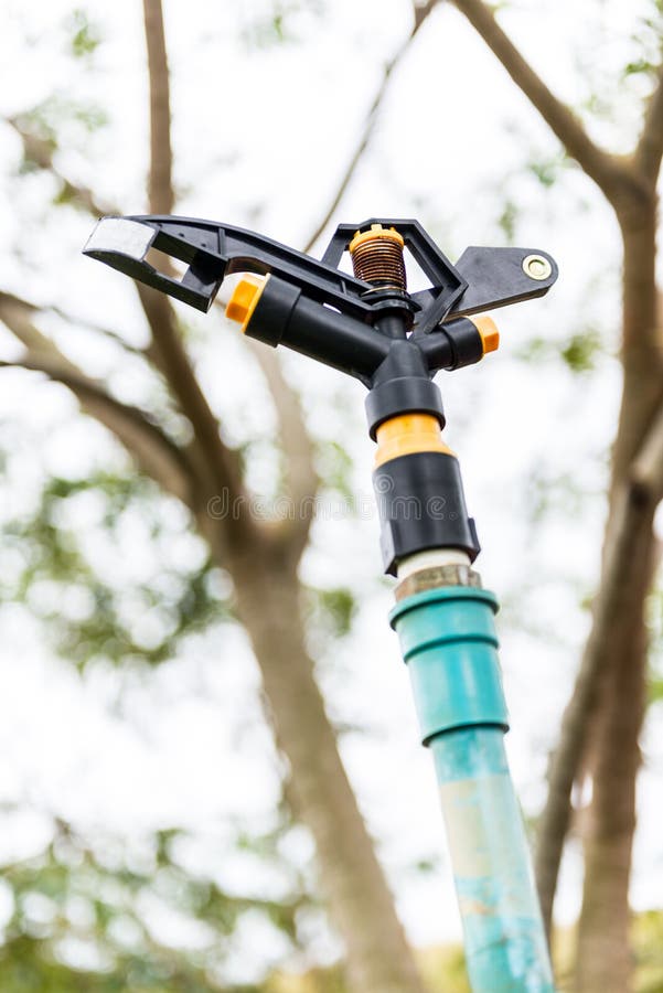 Plastic sprinkler pole stock image. Image of spray, agriculture - 35341295