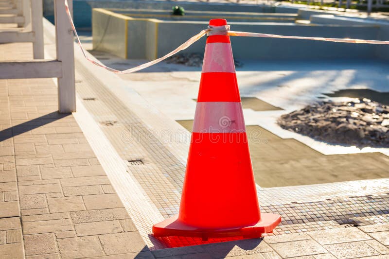 Plastic Striped Orange Cone on the Road. Traffic Cone Stock Image ...