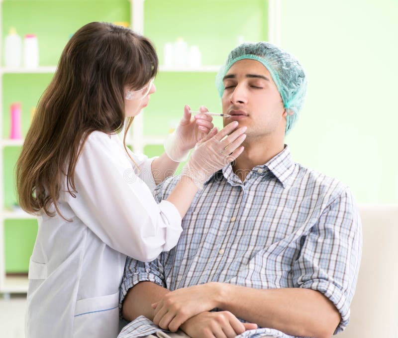 Plastic Surgeon Preparing for Operation on Man Face Stock Photo - Image ...