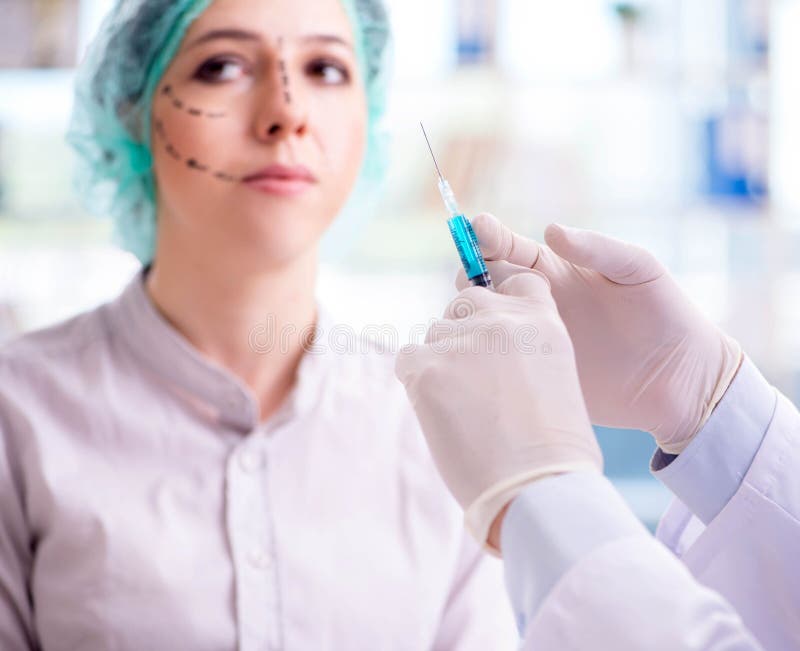 The Plastic Surgeon Preparing for Operation on Woman Face Stock Image ...