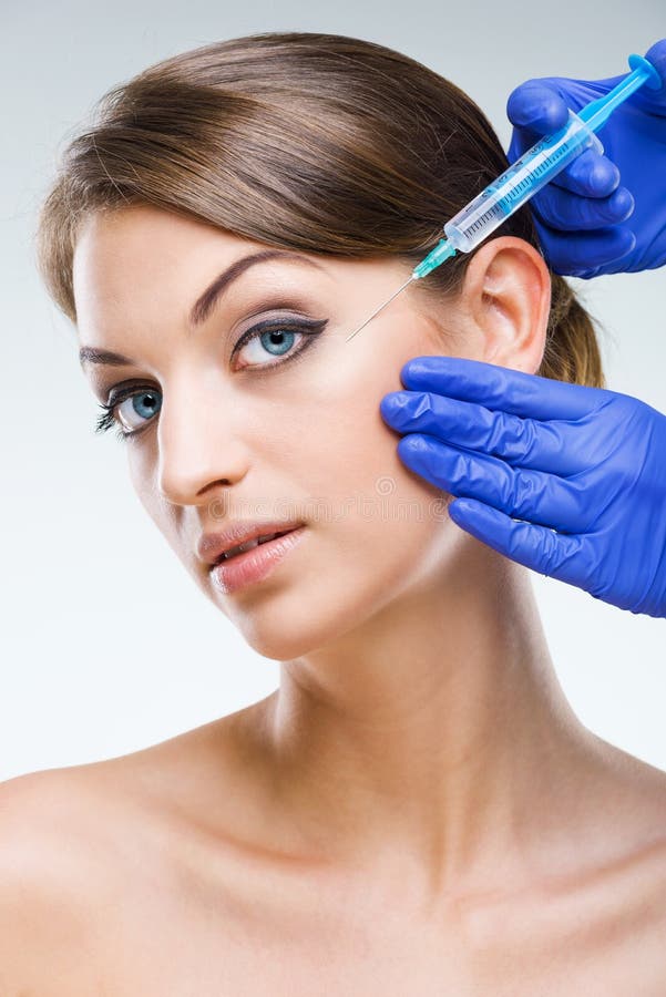 Plastic Surgery - Beautiful Woman S Face with Hypodermic Needle Stock ...