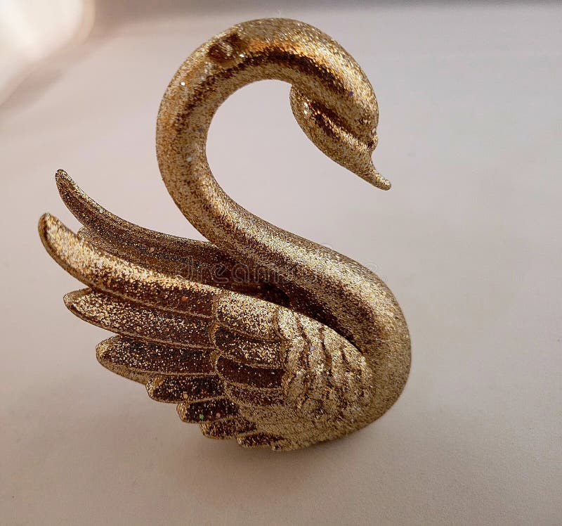 Golden swan stock image. Image of golden, bird, plastic - 242364027