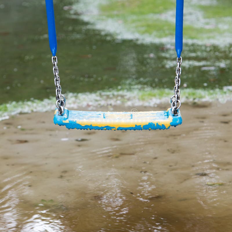 Plastic Swing Hanging Over Puddle Stock Photos - Free & Royalty-Free ...