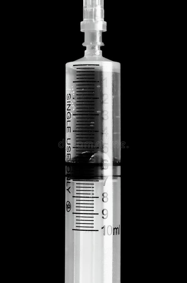 Plastic Syringe Isolated on Black Background Stock Photo - Image of ...