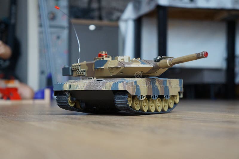 Plastic Tank Toy on the Floor Stock Photo - Image of play, material ...