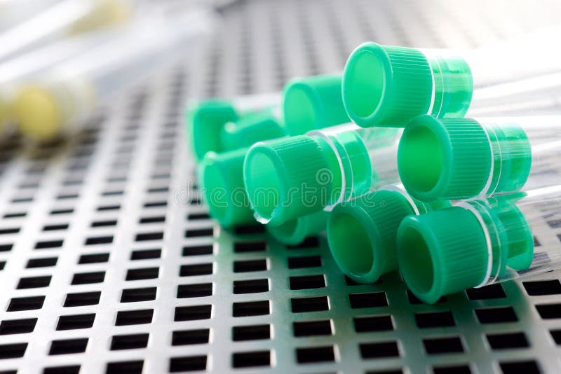 Plastic Test Tubes on a Gridded Metal Surface Stock Photo - Image of ...