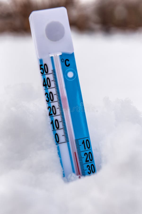 Thermometer in the snow stock photo. Image of equipment - 104121188
