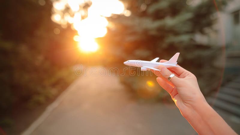 Plastic Toy Airplane in the Hand Simulates a Flight. Stock Image ...