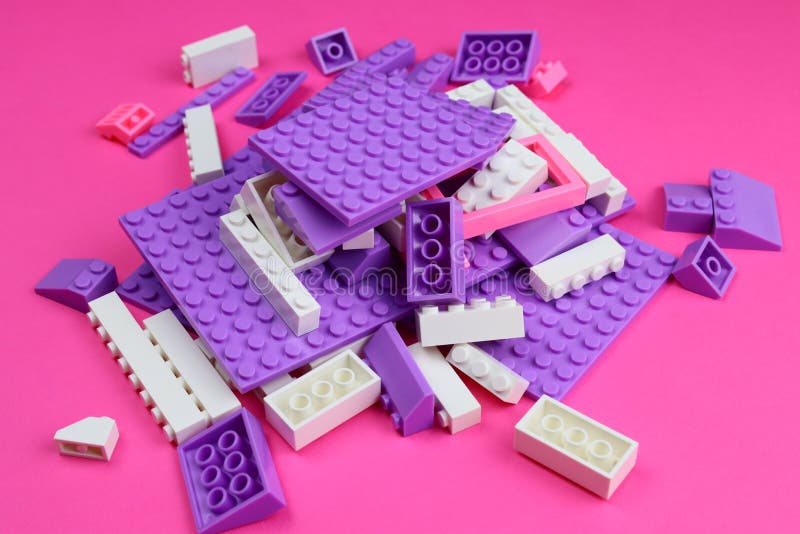 Plastic Toy Colored Blocks on Pink Background Stock Photo - Image of ...