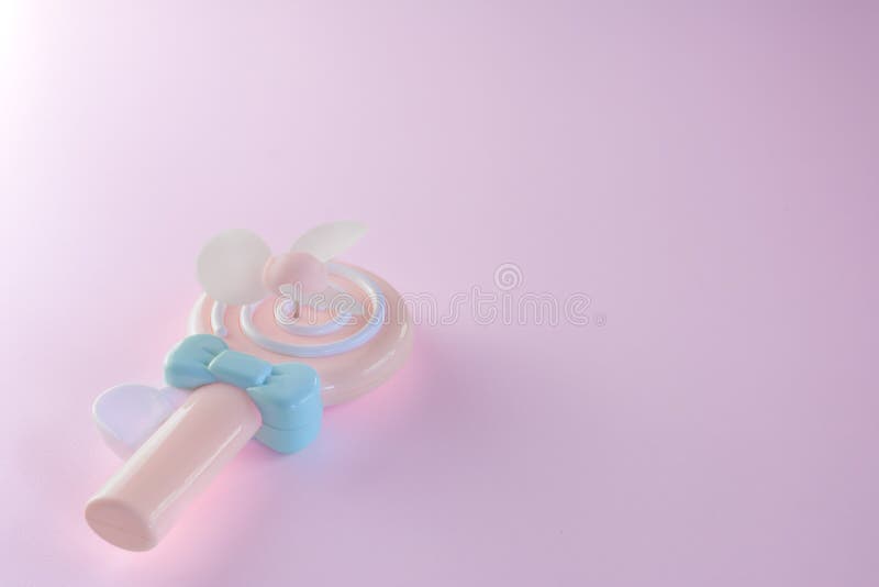 Plastic Toy Fan on Pink Background Stock Photo - Image of windmill ...
