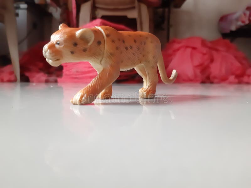 Plastic Toy Leopard on White Lapel.Toy Leopard Stock Image - Image of ...