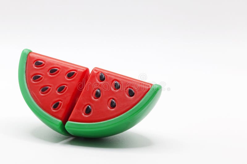 A Plastic Toy Watermelon on a White Background Stock Photo - Image of ...