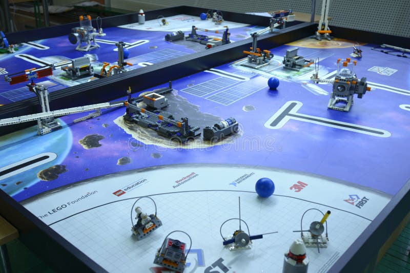 Plastic Toys Robots Assembled of Plastic Blocks Set on a Table for ...