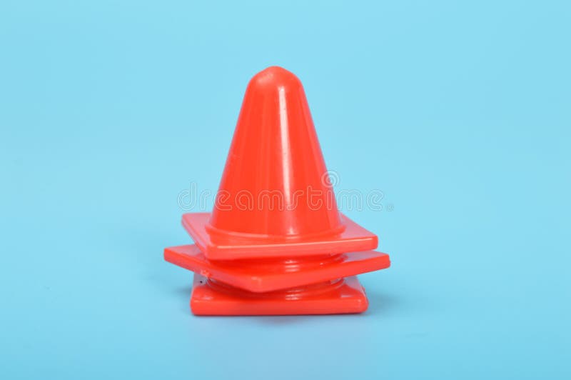 Plastic Traffic Cone Isolated on a Blue Background Stock Image - Image ...