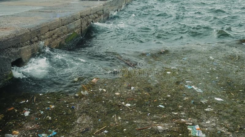 Trash in the sea. stock video. Video of rippling, environment - 247675453