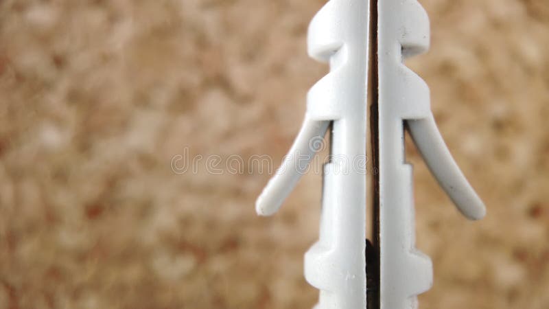 Plastic Wall Plug for Fixing Screws in the Wall on an Insulated ...