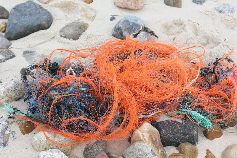 Plastic Waste and Residues of Nets on the Beach Stock Image - Image of ...