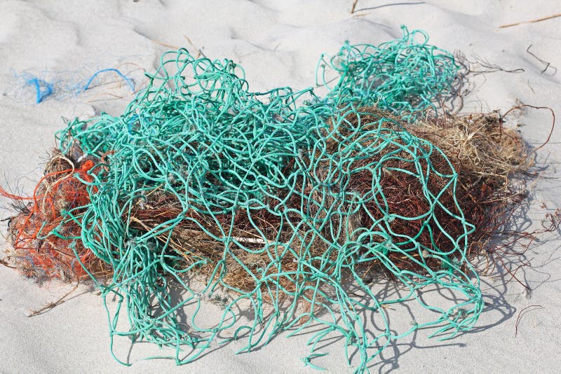 Plastic Waste and Residues of Nets on the Beach Stock Image - Image of ...