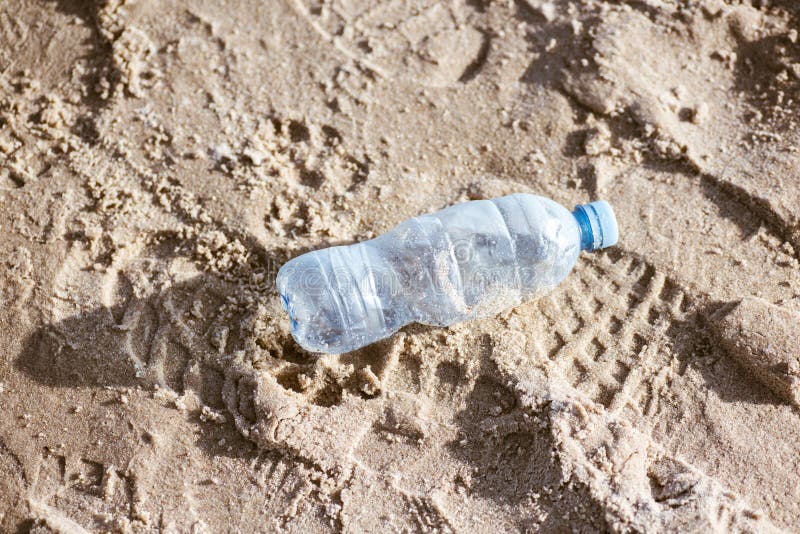 Plastic Water Bottle on a Beach Stock Image - Image of beverage, life ...