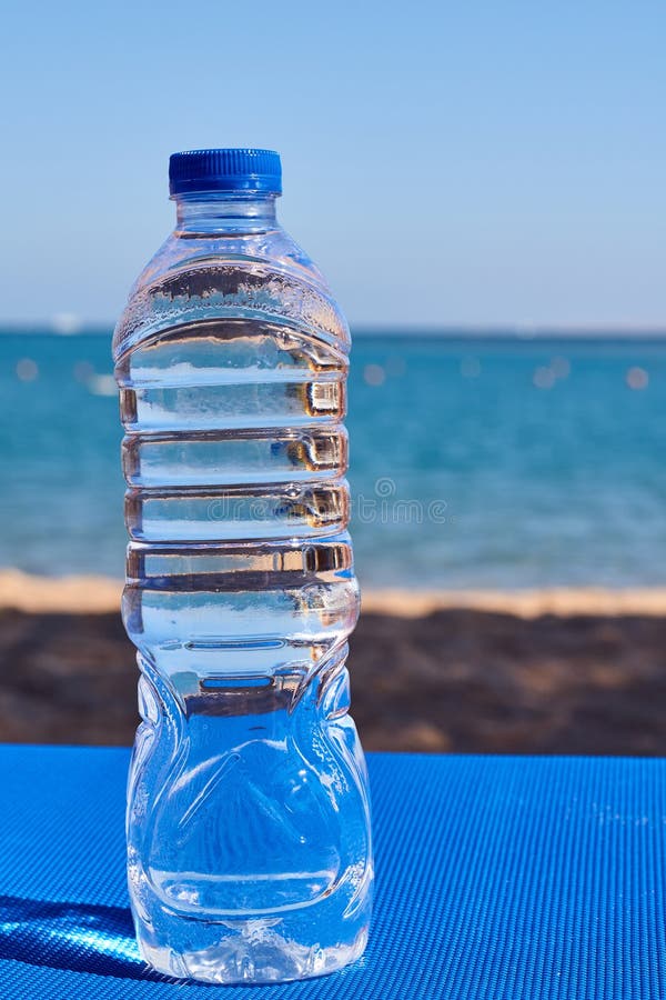 Plastic Water Bottle on the Sea Beach Stock Image - Image of holiday ...