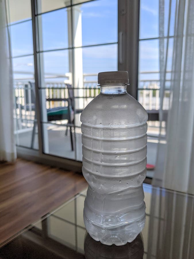 Plastic Water Bottle on Table on Sunny Day Stock Photo - Image of care ...
