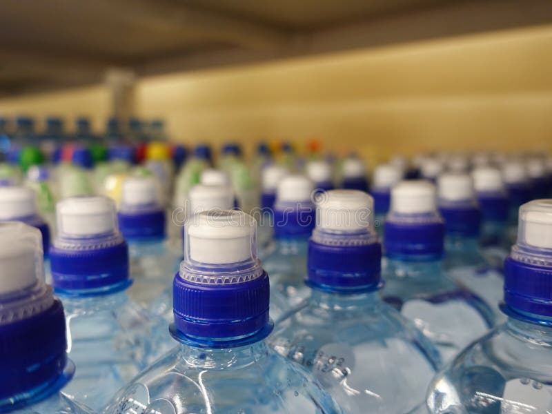 Plastic Water Bottles with Caps of Different Colour. Stock Photo ...