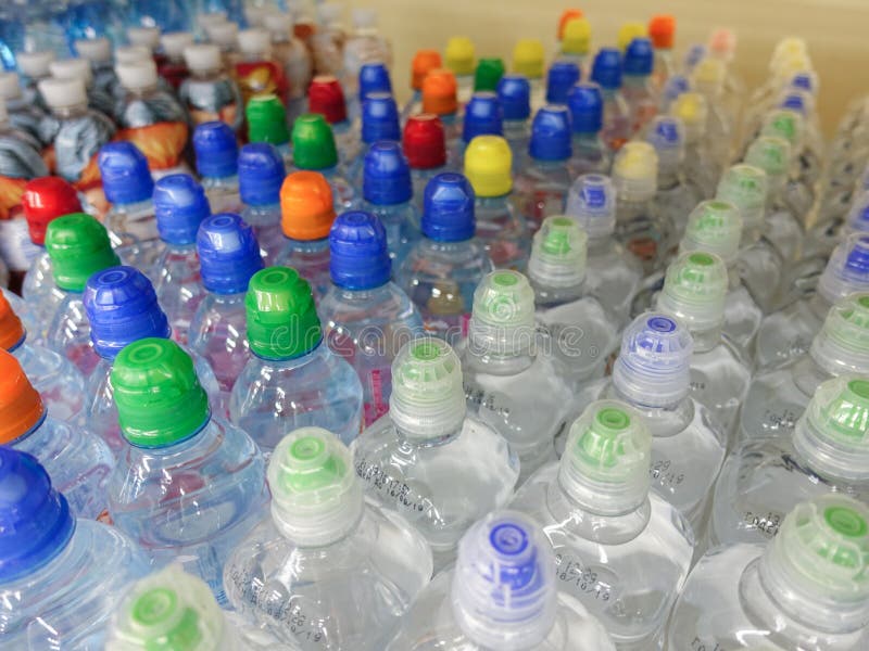 Plastic Water Bottles with Caps of Different Colour. Stock Photo ...