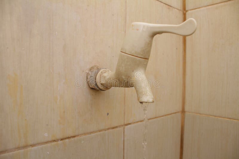 Plastic water faucet stock image. Image of background - 254654039