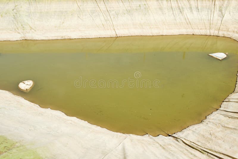 Plastic Water Retention Basin for Irrigation in Agriculture Stock Photo ...