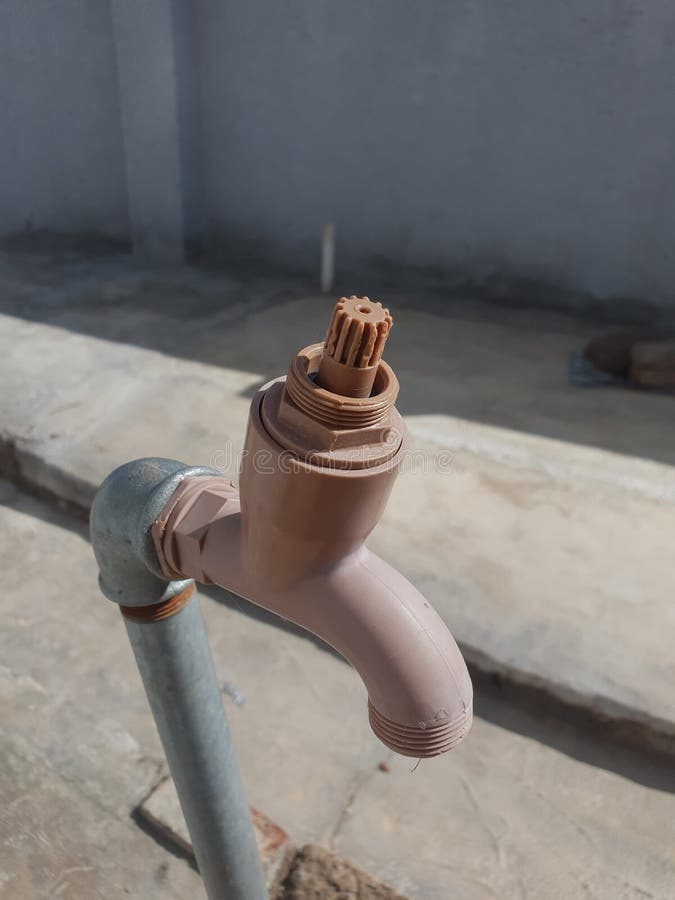 Plastic Water Tap with a Missing Handle Connected To a Metal Pipe Stock ...