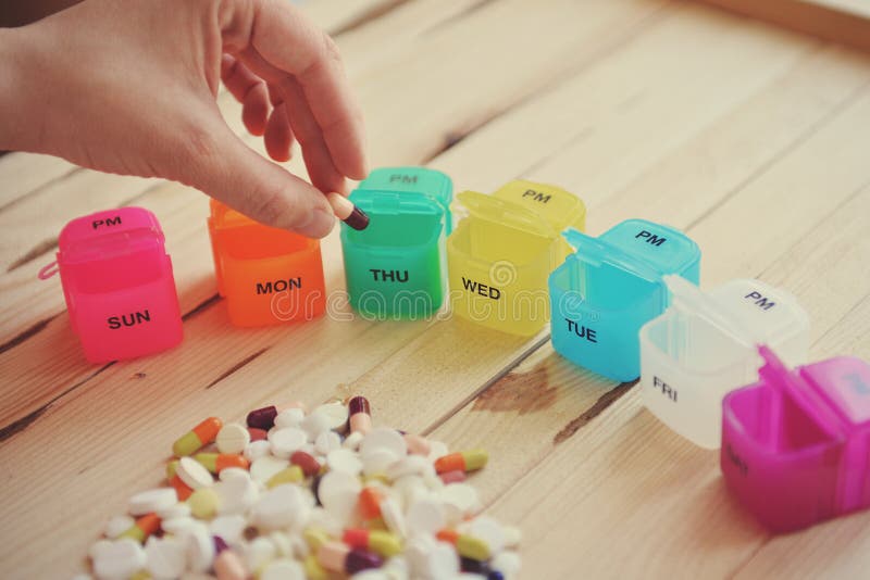 A Plastic Weekly Pill Box. daily Pill Box with Medications and ...