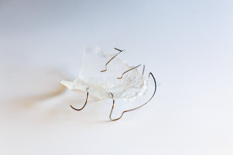 A Plastic White Removable Orthodontic Appliance. Concept of Pediatric ...