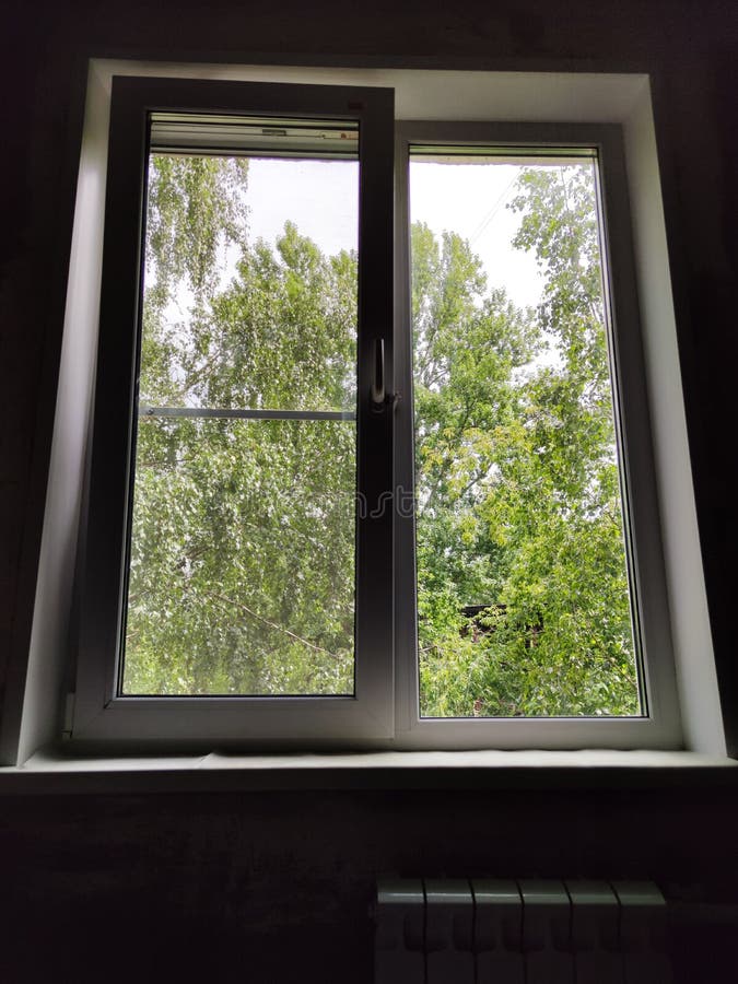 Plastic White Window with a View of Green Trees Stock Photo - Image of ...