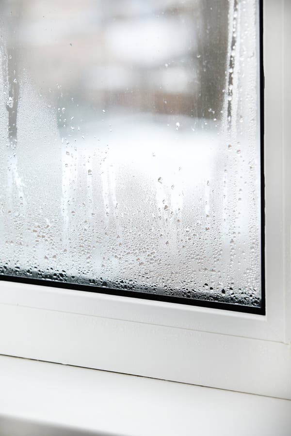 A Plastic Window with Condensation of Water on the Glass. Double Glazed ...
