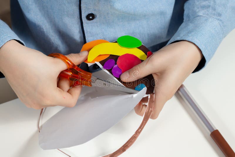 Plastic Work Done by a Child. the Boy is Cutting Out with Paper ...
