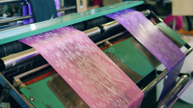 Plastic Wrapping Paper is Getting Produced by a Factory Machine Stock ...