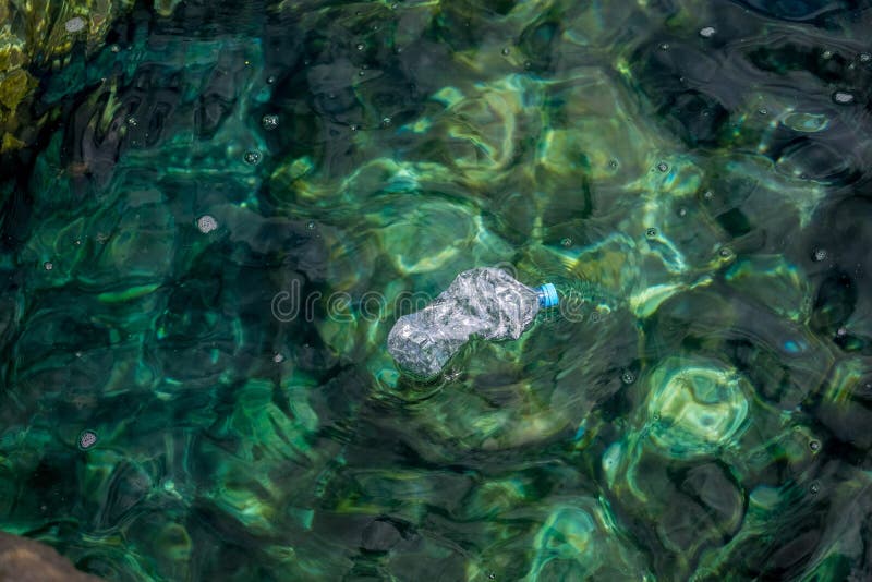 Plastics and Plastic Bottles at Sea with Very Clean and Crystal Clear ...