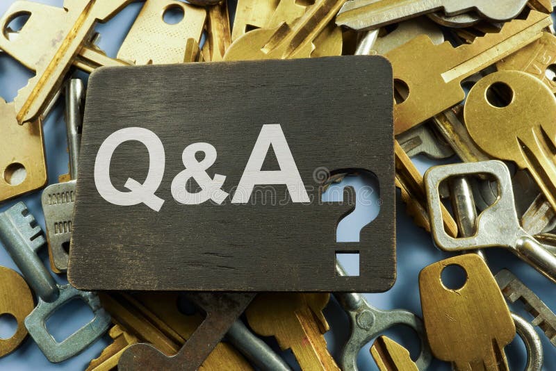 A Plate with the Abbreviation Questions and Answers on a Pile of Keys ...