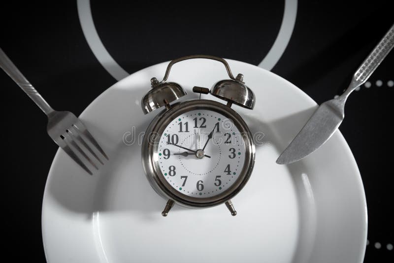 Plate with a Alarm Clock Fork and Knife Stock Photo - Image of awake ...