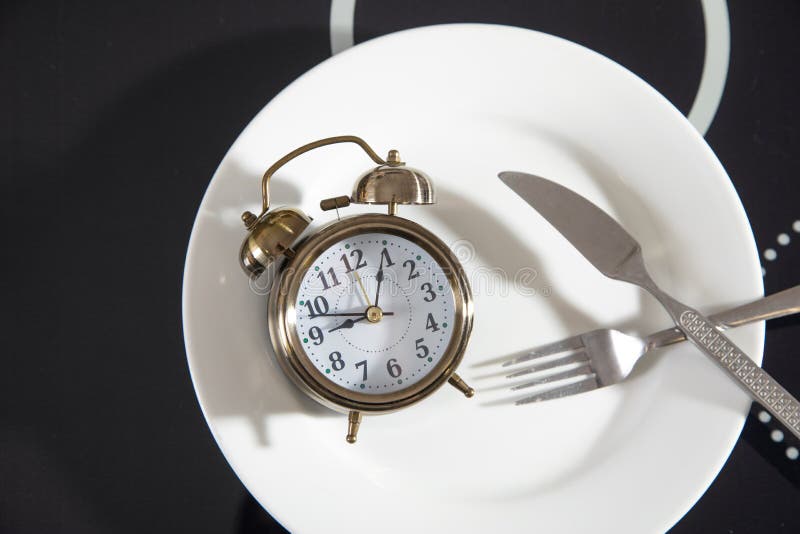Plate with a Alarm Clock Fork and Knife Stock Photo - Image of meal ...