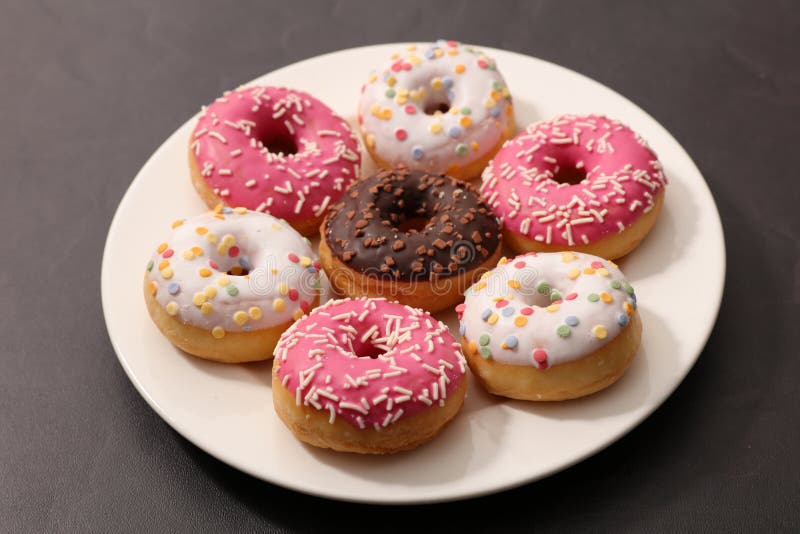 Assorted delicious donut stock image. Image of bakery - 107516533