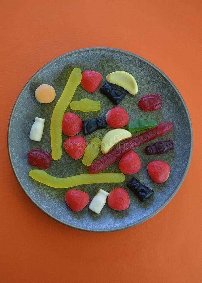Colorful Chewy Candies on a Plate Stock Image - Image of person, party ...