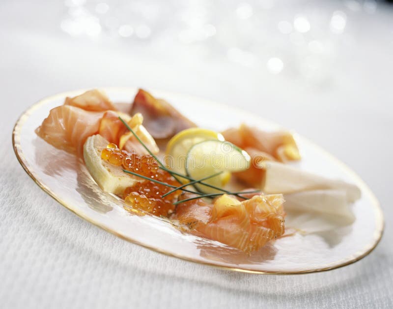 Plate of Assorted Smoked Fish Stock Photo - Image of eggs, expensive ...