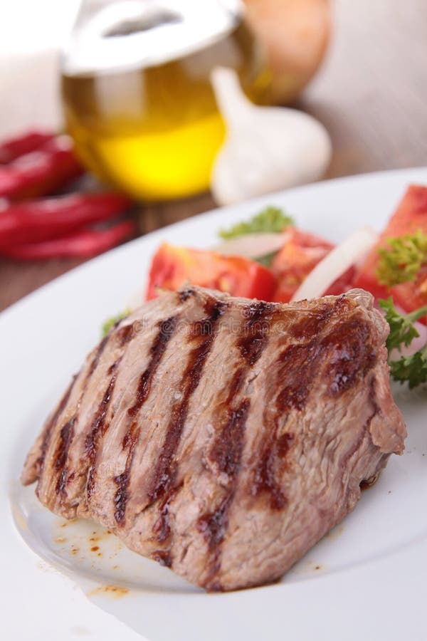 Plate of beef grilled stock image. Image of dish, gastronomy - 27563867