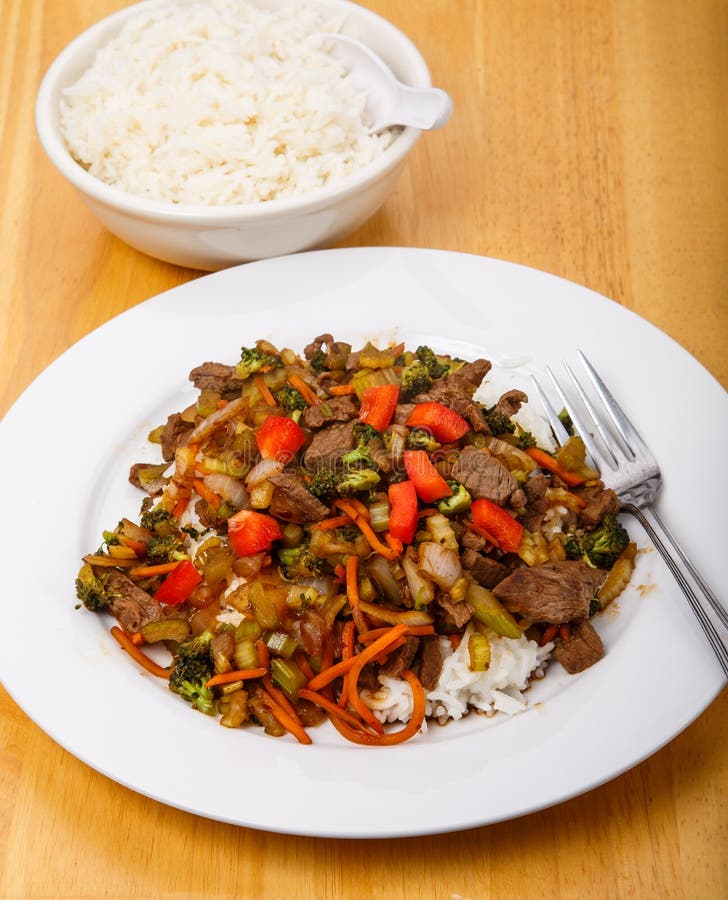 Plate of Beef Stir-fry and Bowl of Rice Stock Photo - Image of healthy ...